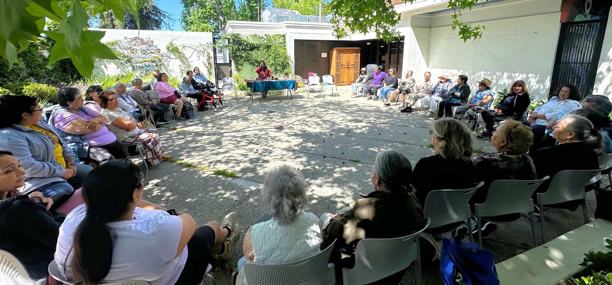 Community members meeting at East Side patio